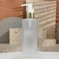 China 24/410 Long Nozzle Plastic Cosmetic Lotion Pump Gold Aluminum Closure Metal Shell With Clip for sale