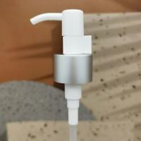 China 24/410 Plastic Cosmetic Lotion Oil Pump Silver Aluminum Closure Metal Shell With Clip for sale