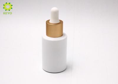 China Cylinder White Glass Essential Oil Packaging Bottles With Matte Gold Dropper Cap 30ml for sale