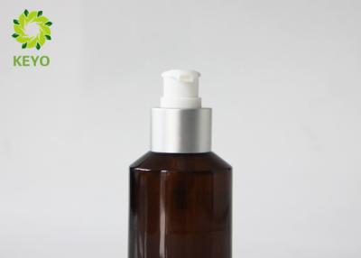 China Amber Glass Essential Oil Bottles , 100ml Slanted Shoulder Serum Bottle With Pump for sale
