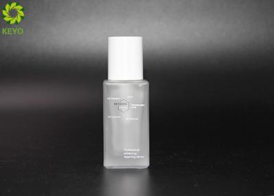 China Luxury Moisturizer Glass Bottle 1 OZ 30ml With Round White Press Pump Cap for sale