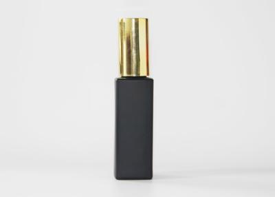 China Luxury 1 OZ Empty Glass Pump Bottles Matte Black Color For Face Essential Serum for sale