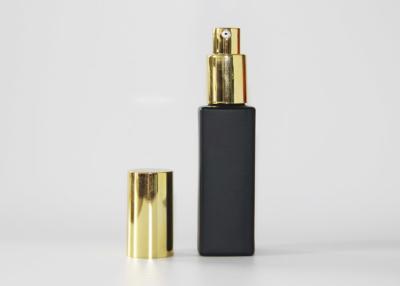 China 30ml Matte Black Essential Oil Bottles Luxury Glass Serum Bottle With Pump for sale