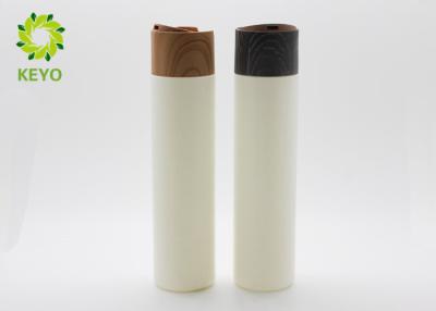 China 8 OZ Cylindrical Shampoo And Conditioner Bottles With Wooden Color Press Cap for sale
