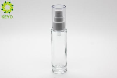 China Clear Glass Foundation Bottle , Round Shape 30ml Empty Glass Pump Bottles for sale