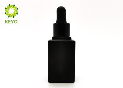 China 20ml Glass Empty Cosmetic Bottles Matte Black Color With Aluminum Droppers for sale