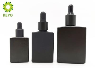 China 15ml 30ml 50ml Matte Black Square Glass Dropper Bottles For Essential Oil for sale