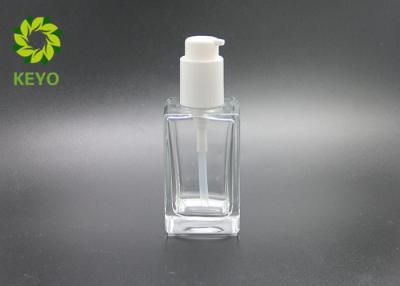 China Clear Square Glass Bottles , Empty Cosmetic Bottles Wtih White Lock Pump for sale
