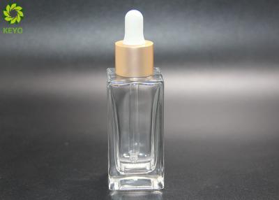China 30ml Packaging Flat Shoulder Square Cosmetic Glass Bottles With Dropper for sale
