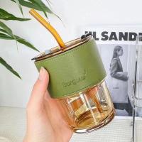 China 420ml 450ml Soda Lime Glass Reusable Coffee Cups With Lids Leak Proof Travel Mug for sale