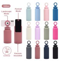 China 2024 New Magnetic Insulation Cup Mobile Phone Holder Water Cup Large Capacity 1L Large Mouth Stainless Steel Sports Wate for sale