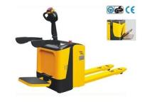 China Stand On Type 2500kg Electric Pallet Truck Jack Forklift With Folding Platform for sale