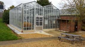 China Highly Protective Glass Greenhouse With UV Protection for sale