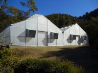 China Blackout System Light Deprivation Greenhouse With PC Sheet Covering for sale