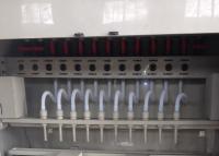 China Inline Vacuum Bottle Filler 50ml Plastic Bottle Filling Machine for sale
