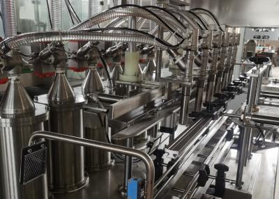 China 1000KG Automatic Water Filling Machine SUS316L Vacuum Bottle Filler for sale