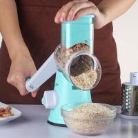 China Upgrade Your Kitchen with this Manual Rotary Cheese Grater Round Tumbling Box Shredder for sale