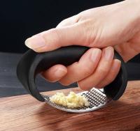 China Custom Logo Fruit Vegetable Tools Stainless Steel Garlic Press Chopper Kitchen Gadget Tool for sale