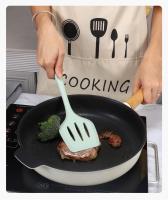 China 995G Silicone Kitchen Utensil Set 12-Piece Non-Stick with Wooden Handle and Storage Bucket for sale