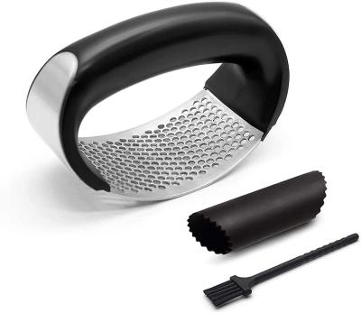 China 403 Stainless Steel Garlic Press Peeler Manual 11.2cm Kitchen Tool for Fruit Vegetable for sale