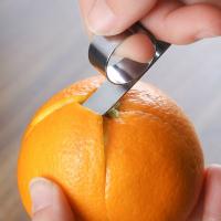 China 430 Stainless Steel Ring Mini Fruit Peeler Manual Orange Peeler 7.5cm Kitchen Gadget for sale