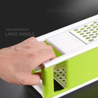 China Multifunctional Fruit Vegetable Tools Onions Potato Peeler Slicer Cutter Chopper Grater for sale