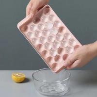 China 33 Cavity Circle Round Ball Ice Cube Tray Sphere Plastic Ice Ball Maker Mold with Lid for sale