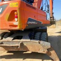 China Transport Length 9.445m Doosan DX210W Used Excavator with 0.92m3 Bucket Capacity for sale