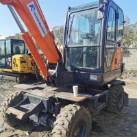 China Multifunctional DOOSAN DX60W Wheeled Excavator 4TNV94L Engine 5.7 Ton Operating Weight for sale
