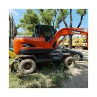 China 2560 Working Hours Doosan Mini Wheel Digger DX 60W Used 6 Ton Wheel Shovel In Shanghai for sale