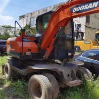 China 2560 Working Hours Doosan Mini Wheel Digger DX 60W Used 6 Ton Wheel Shovel In Shanghai for sale