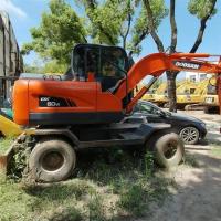 China 2560 Working Hours Doosan Mini Wheel Digger DX 60W Used 6 Ton Wheel Shovel In Shanghai for sale