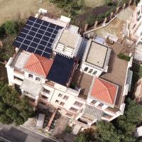 China Rixin PERC Monocrystalline Solar PV Module Rotating Shading On The Building for sale