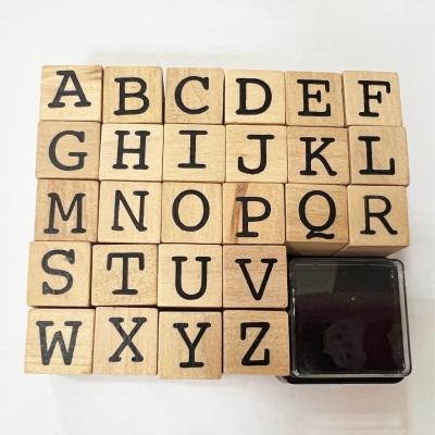 China Customization 26pcs Alphabet Letter Stamp Set Wooden Stamps With Ink Pad for Kids Educational for sale