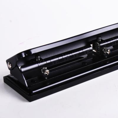 China Metal 3 hole punch stationery desktop office 3 hole adjustable punch for sale