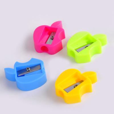 China apple shape plastic cheap pencil sharpeners for sale