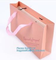 China Custom Printed Paper Carrier Bag 300gsm Ivory Board with Ribbon Handle for Christmas Gift Packaging for sale