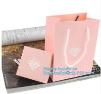 China Luxury Rope Handle Laminated Paper Carrier Bags 200gsm Kraft Paper Shopping Bags for sale