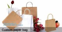China Luxury Custom Black Gold Embossed Logo 250gsm C1S Art Paper Gift Shopping Bag with Ribbon Bow Handles for sale