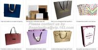 China Customized Black Printed Luxury Gift Paper Shopping Bag 250gsm Ivory Board with Ribbon Handle for sale