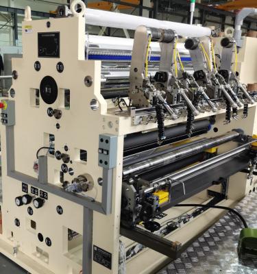 China Min. 0.4mm Cutting Adges Slitting Rewinder Machine Independent Arm for sale