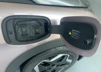 China 2024 BYD Dolphin Honor Edition Electric Vehicle 50W Wireless Phone Charging Red for sale