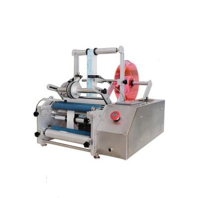 China Semi-Automatic Round Bottle Labeling Machine for 15-120mm Diameter Containers with ±1mm Accuracy for sale