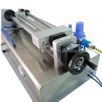 China Semi-Automatic Pneumatic Volumetric Filling Machine FM-03 with 5-25 Bottles/Min Speed and 5-5000ml Range for sale