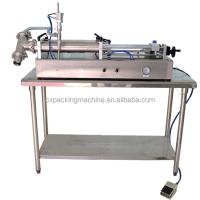 China Semi-Automatic Pneumatic Volumetric Filling Machine FM-03 with 5-25 Bottles/Min Speed and 5-5000ml Range for sale