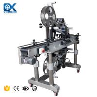 China Automatic Top and Bottom Labeling Machine for Boxes and Bottles - 25-45 PPM Speed, 2000×900×1400mm Dimensions for sale
