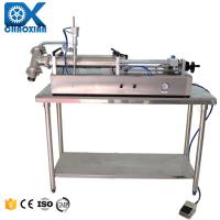 China Semi-Automatic Piston Filling Machine 5-5000ml Range with ±0.5% Accuracy for Liquid Packaging for sale