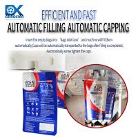 China 10-100ml Double Nozzles Automatic Small Spout Pouch Bag Liquid Filling Capping and Labeling Machine with 20-30 PPM Speed and ±0.5-1% Accuracy for sale