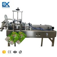 China Semi Automatic Piston Liquid Filling Machine 5-1000ml Portable Sachet Pouch Filler for sale