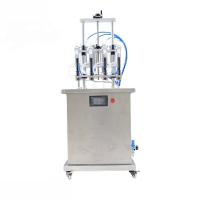China Semi Automatic Vacuum Filler 4 Nozzles 220V 304 Stainless Steel Liquid Bottle Filling Machine for sale